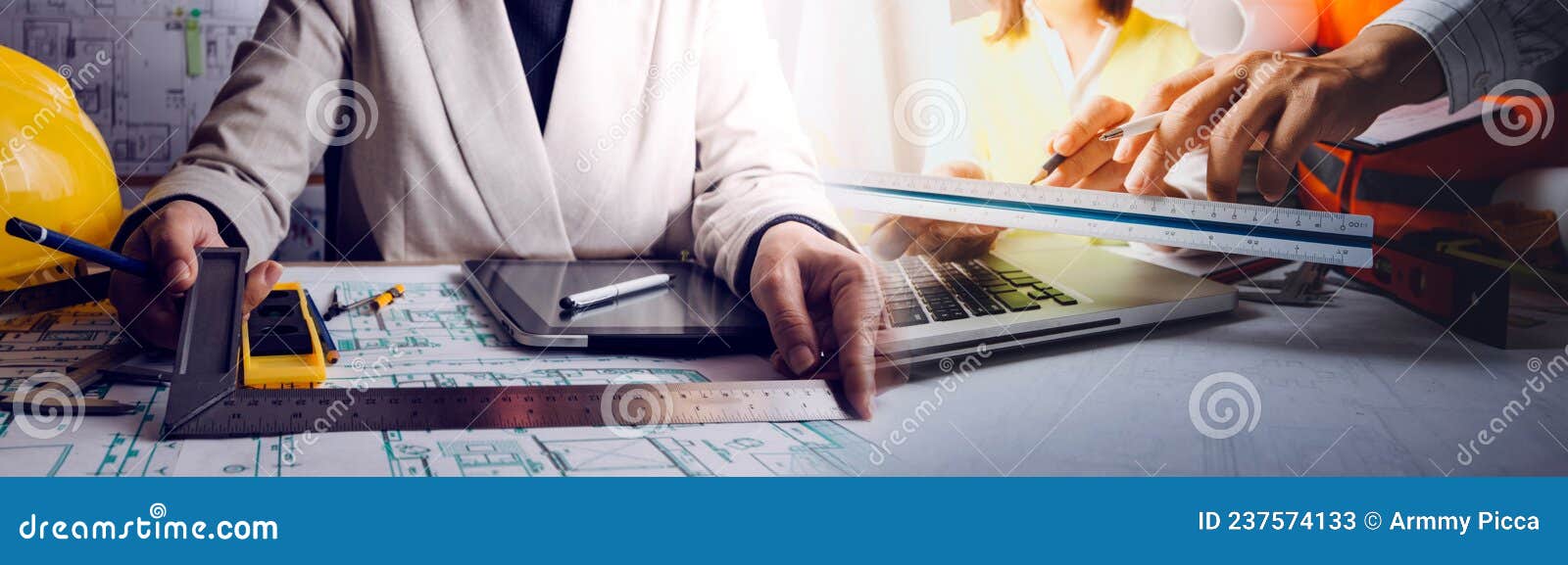 Two Colleagues Discussing Data Working and Tablet, Laptop with on on ...