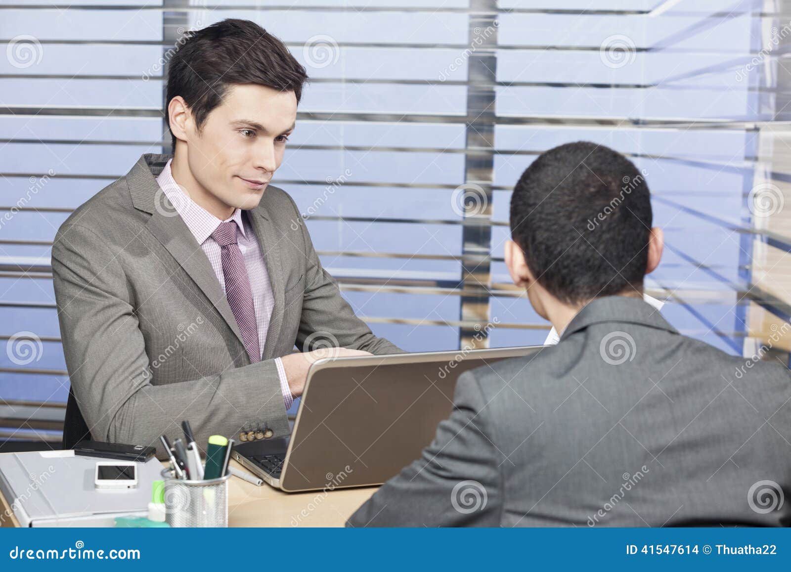 Two colleagues discussing stock photo. Image of manager - 41547614