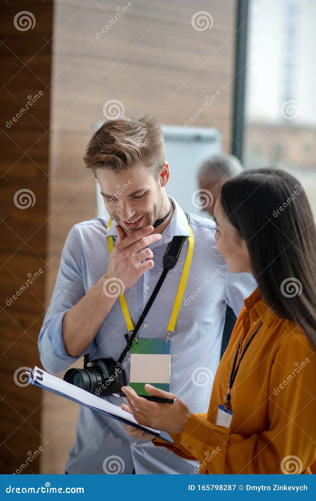 Two Colleagues Discussing Program Details in the Office Stock Image ...