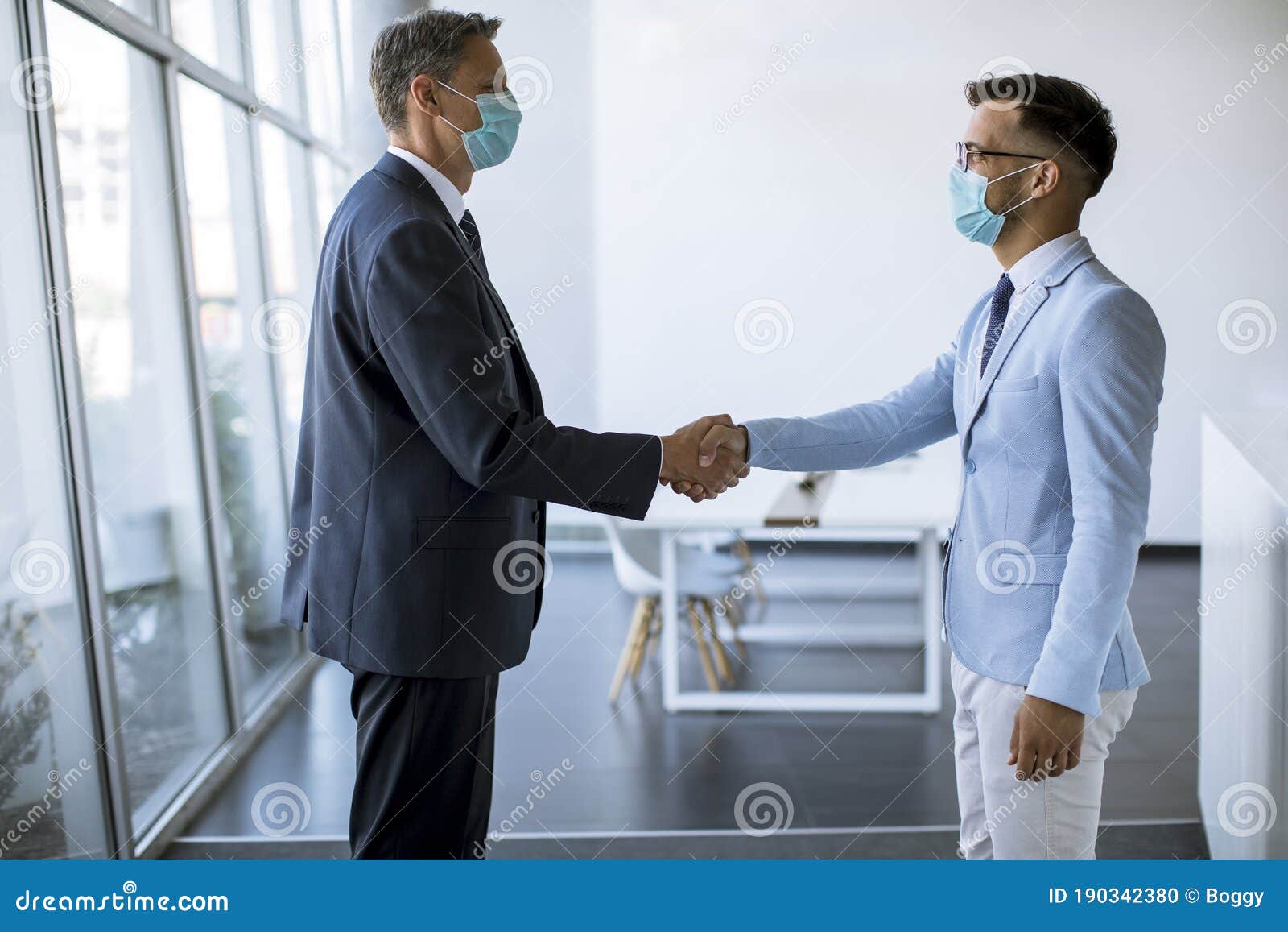 Two Colleagues Handshake when Meeting in the Office Stock Photo - Image ...