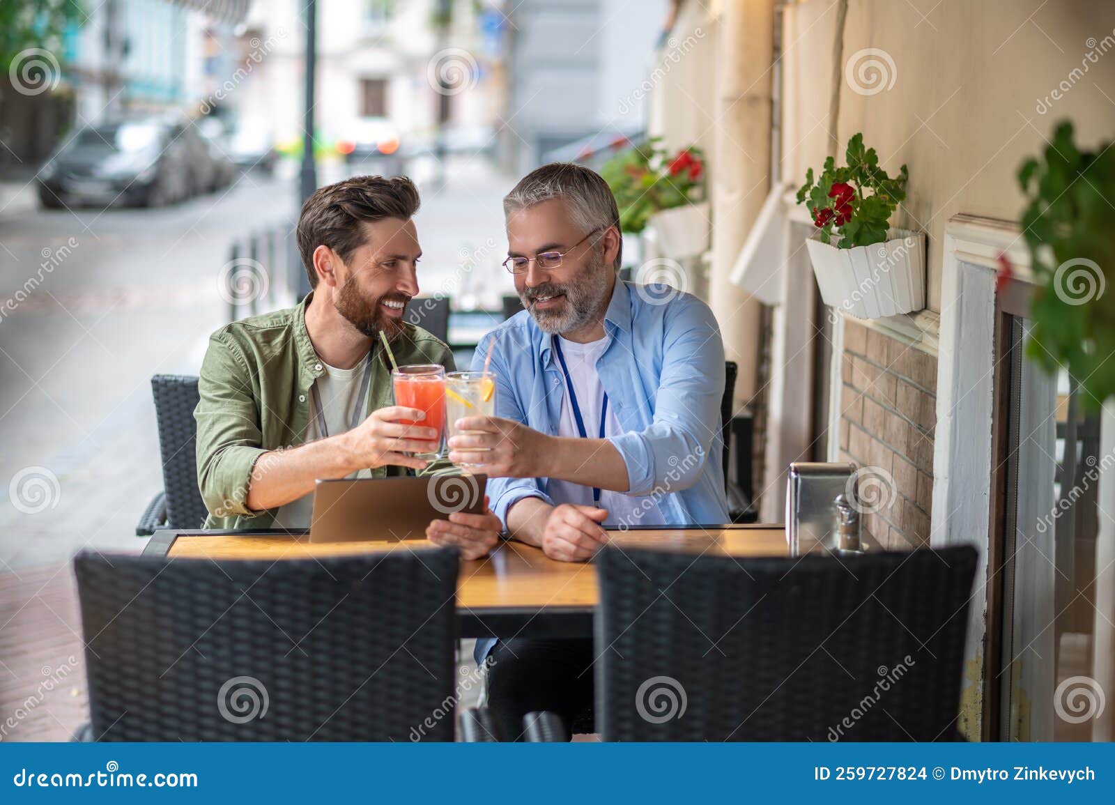 Two Colleagues Having Dinner and Looking Contented Stock Photo - Image ...