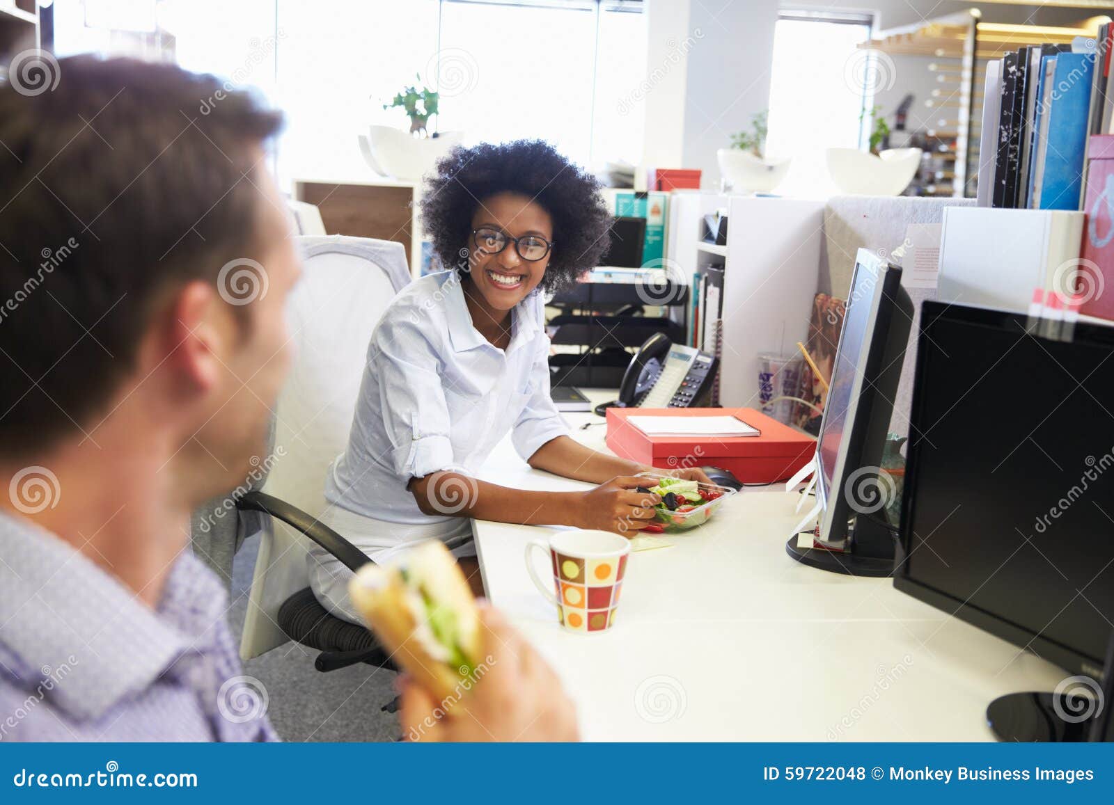 Two Colleagues Having a Lunch Break at Work Stock Photo - Image of ...