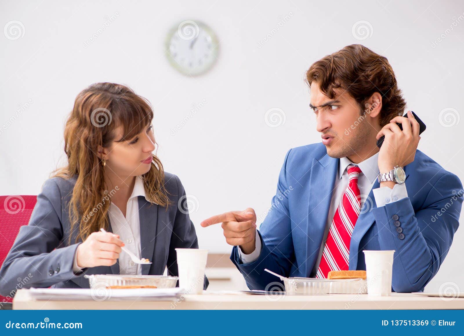The Two Colleagues Having Lunch Break at Workplace Stock Image - Image ...