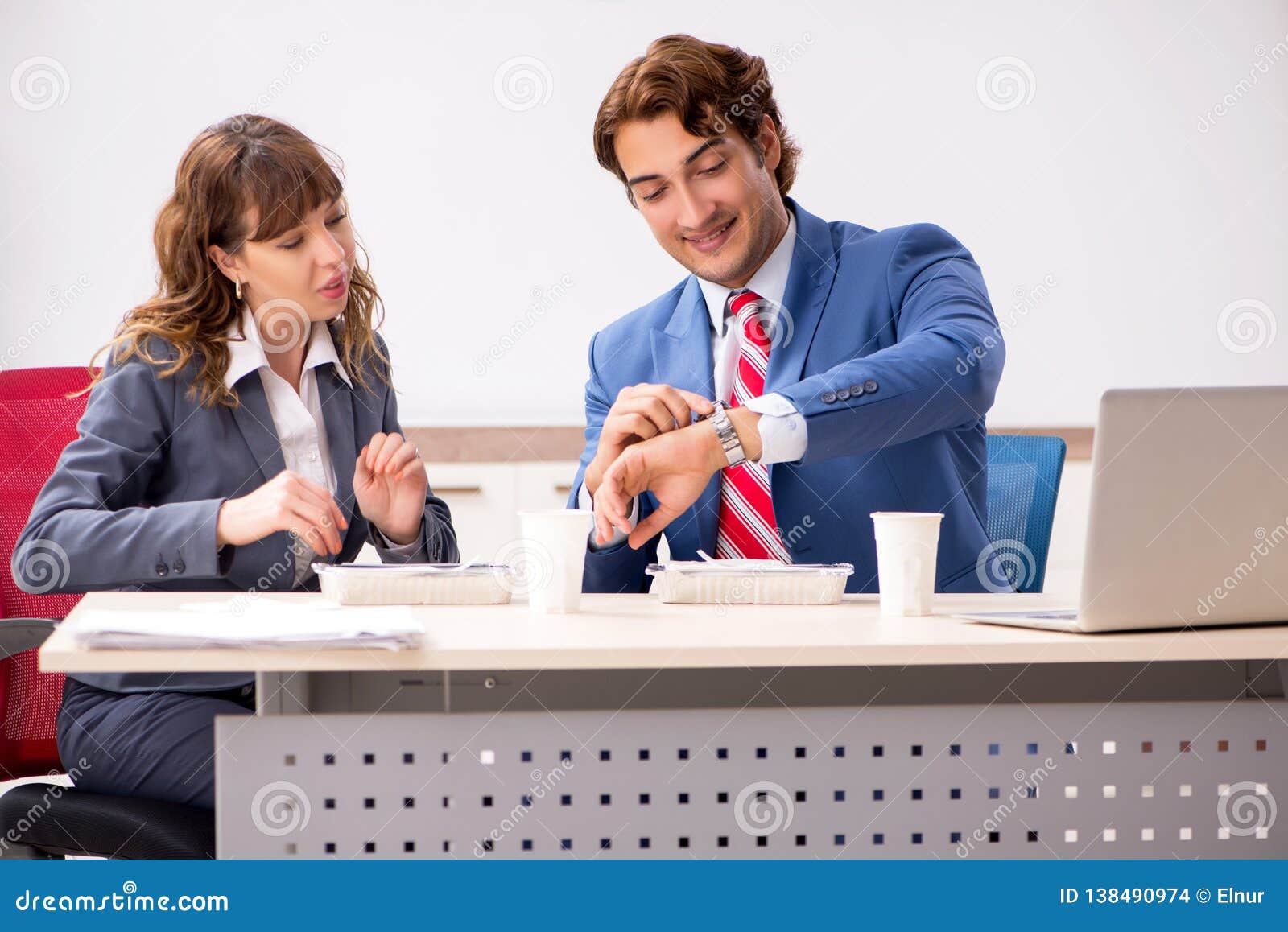 The Two Colleagues Having Lunch Break at Workplace Stock Photo - Image ...