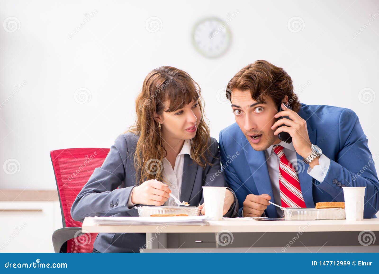 The Two Colleagues Having Lunch Break at Workplace Stock Image - Image ...