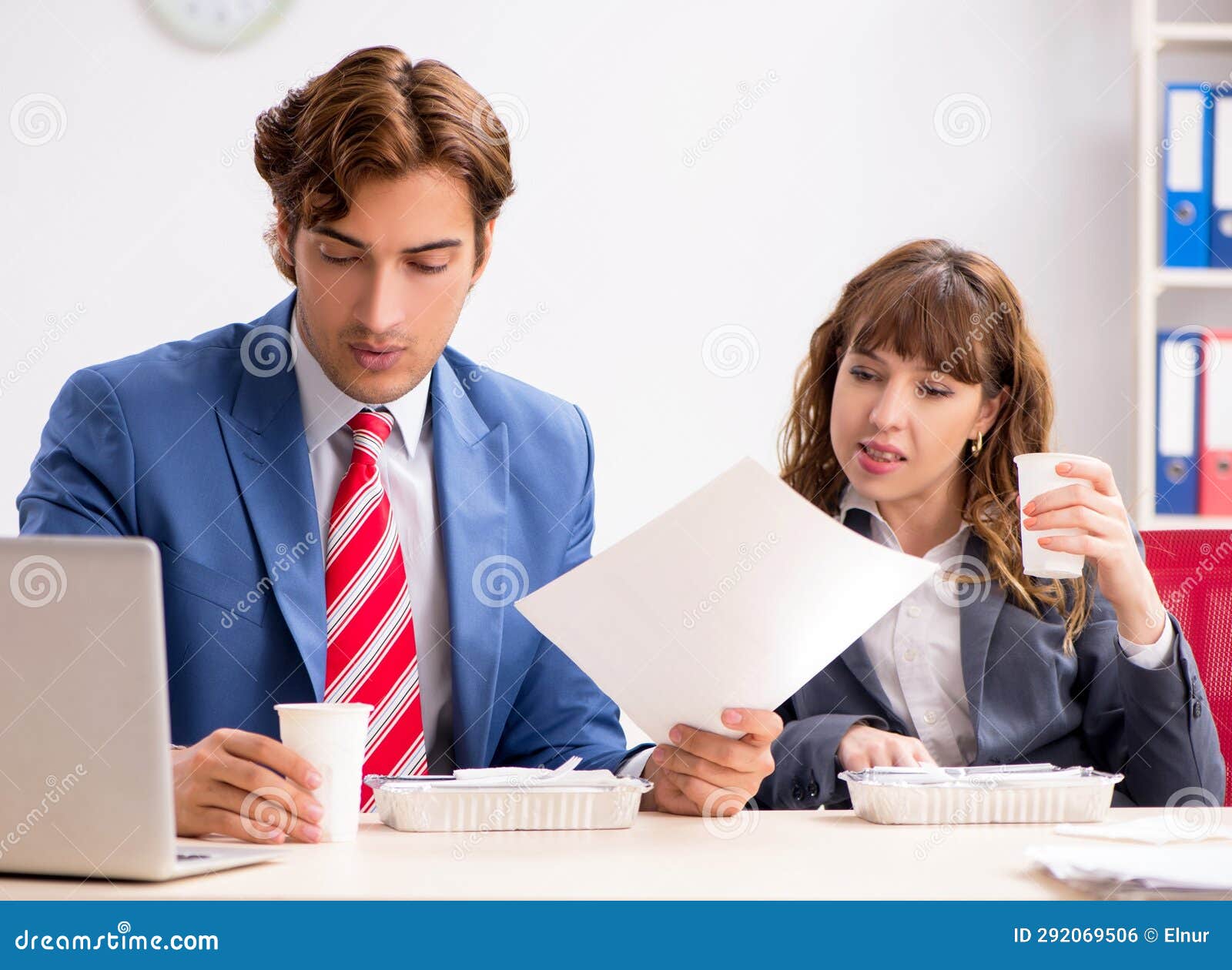 Two Colleagues Having Lunch Break at Workplace Stock Photo - Image of ...