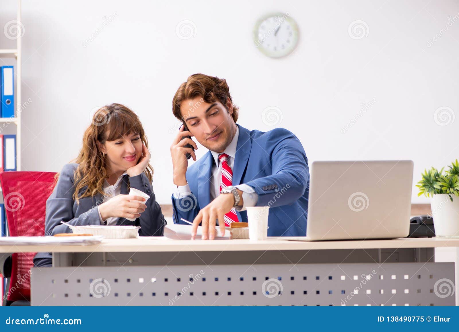 The Two Colleagues Having Lunch Break at Workplace Stock Image - Image ...