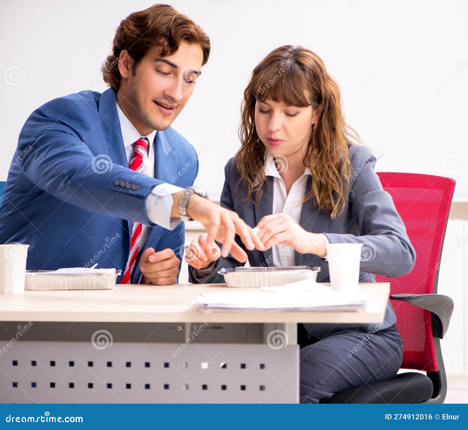 Two Colleagues Having Lunch Break at Workplace Stock Photo - Image of ...