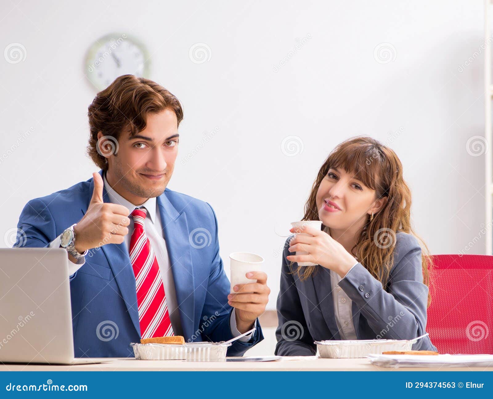 Two Colleagues Having Lunch Break at Workplace Stock Image - Image of ...