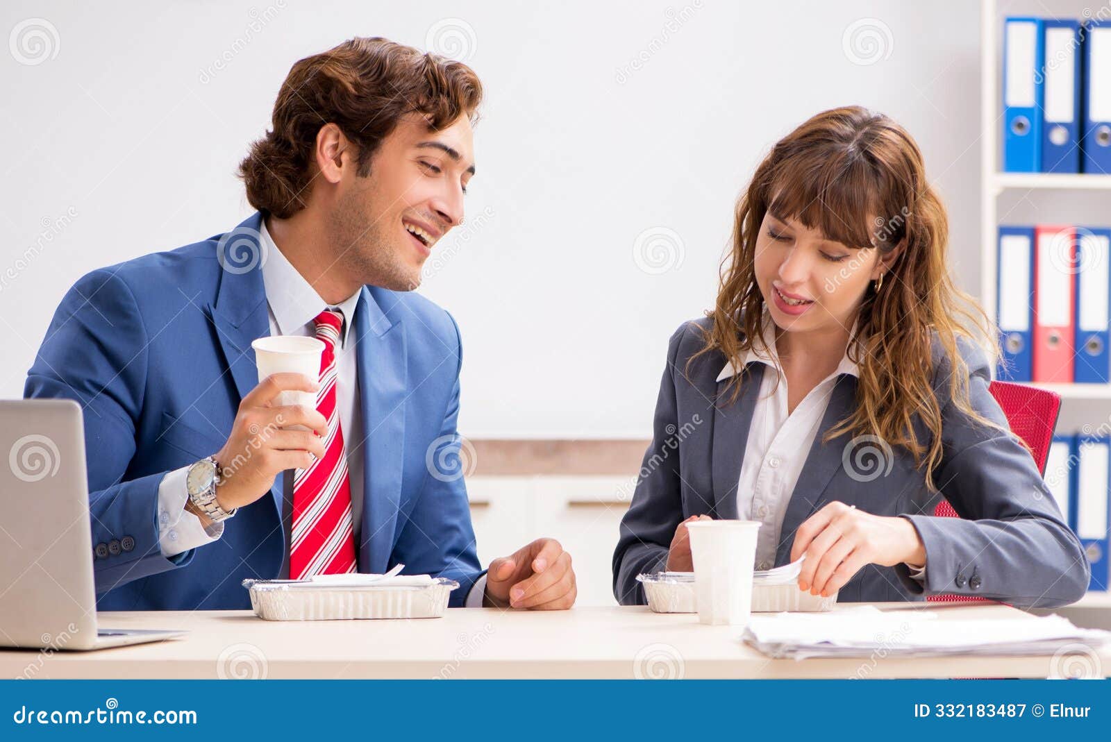 Two Colleagues Having Lunch Break at Workplace Stock Image - Image of ...
