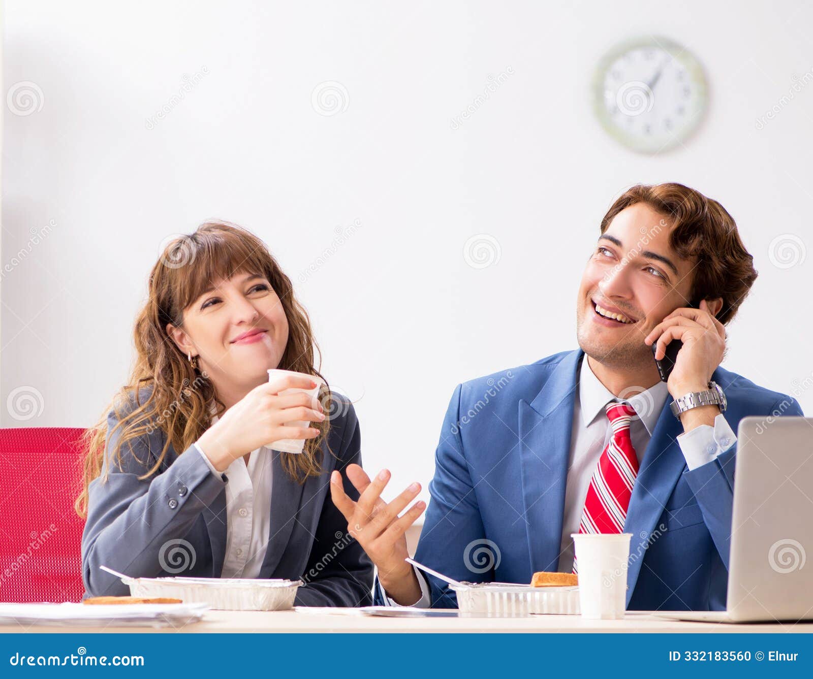 Two Colleagues Having Lunch Break at Workplace Stock Photo - Image of ...