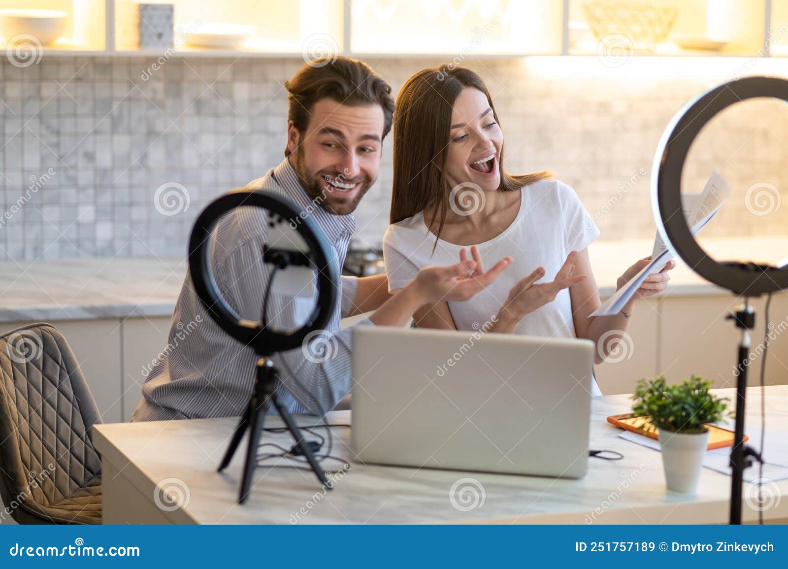 Two Colleagues Having a Video Conference Online and Looking Excited ...