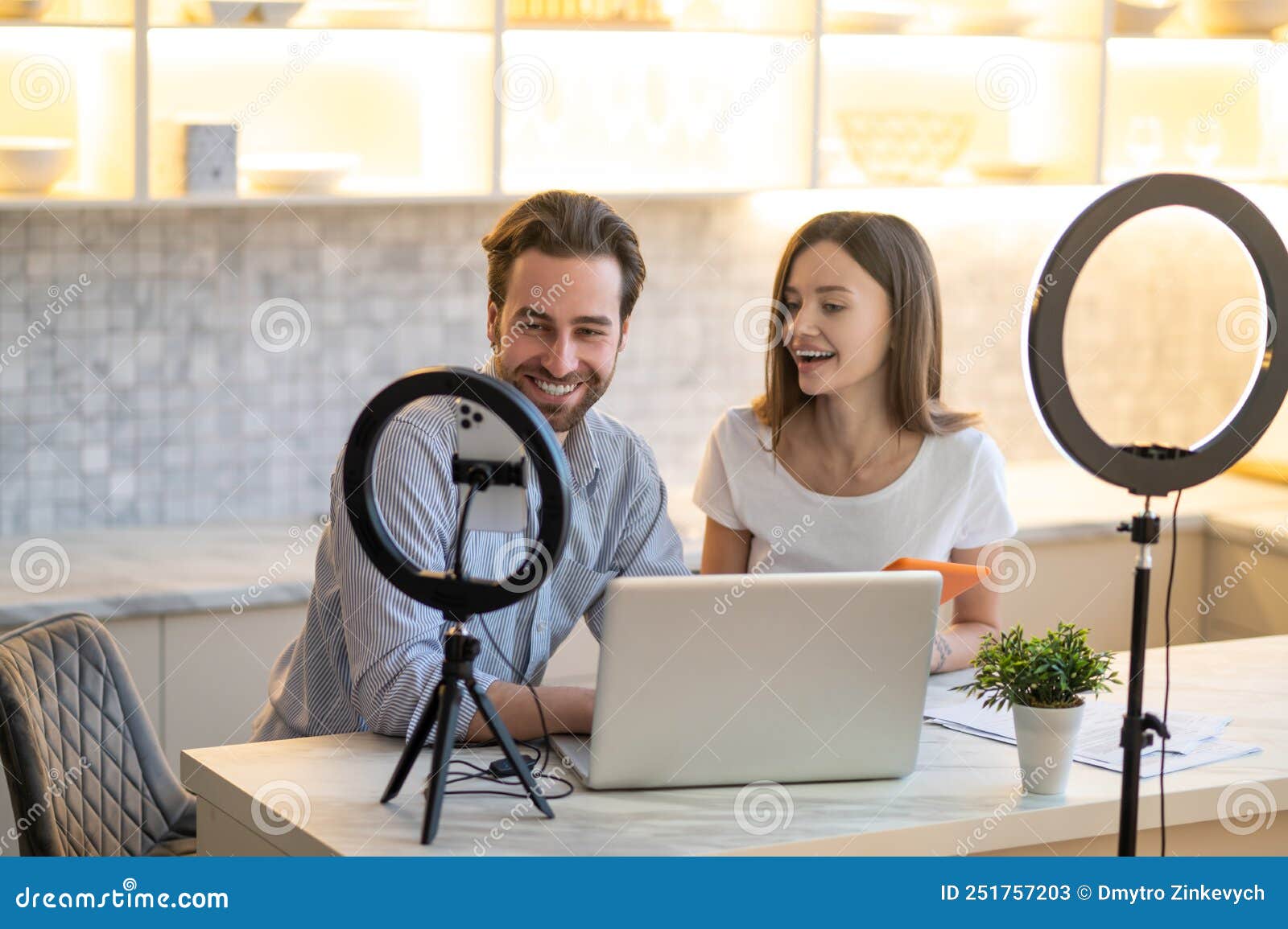 Two Colleagues Having a Video Conference Online and Looking Excited ...