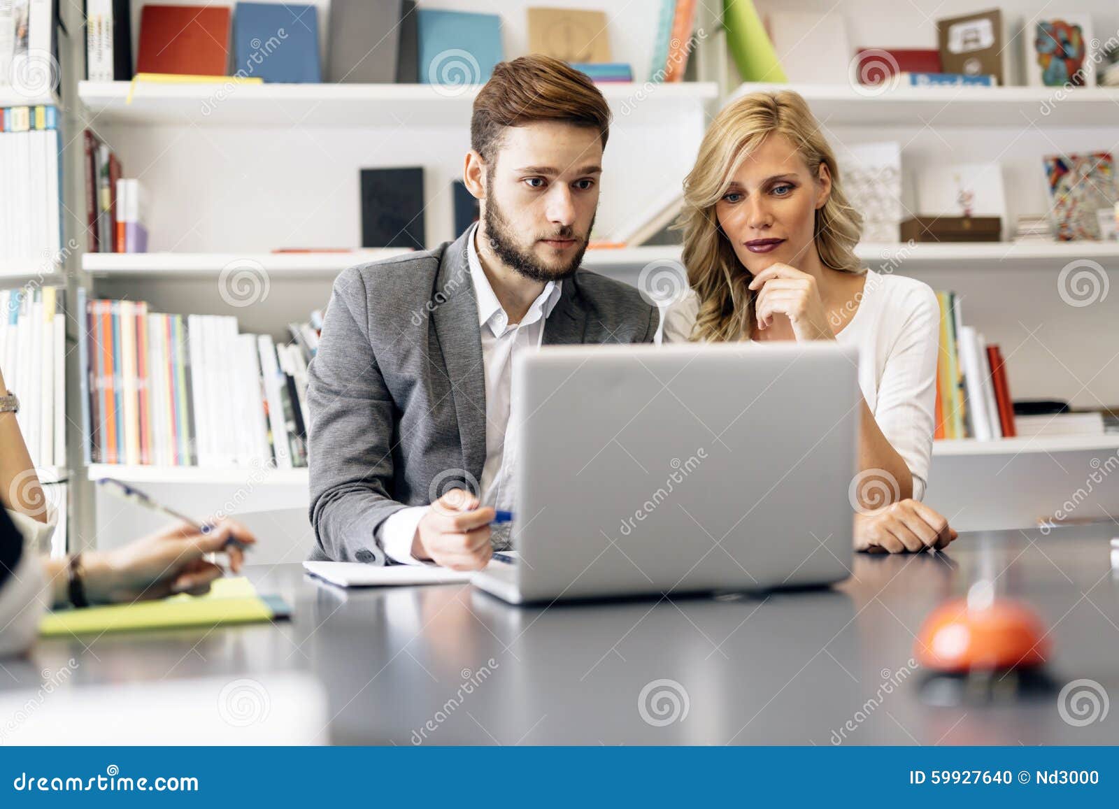 Two Colleagues Solving Problem on Laptop Stock Photo - Image of ...