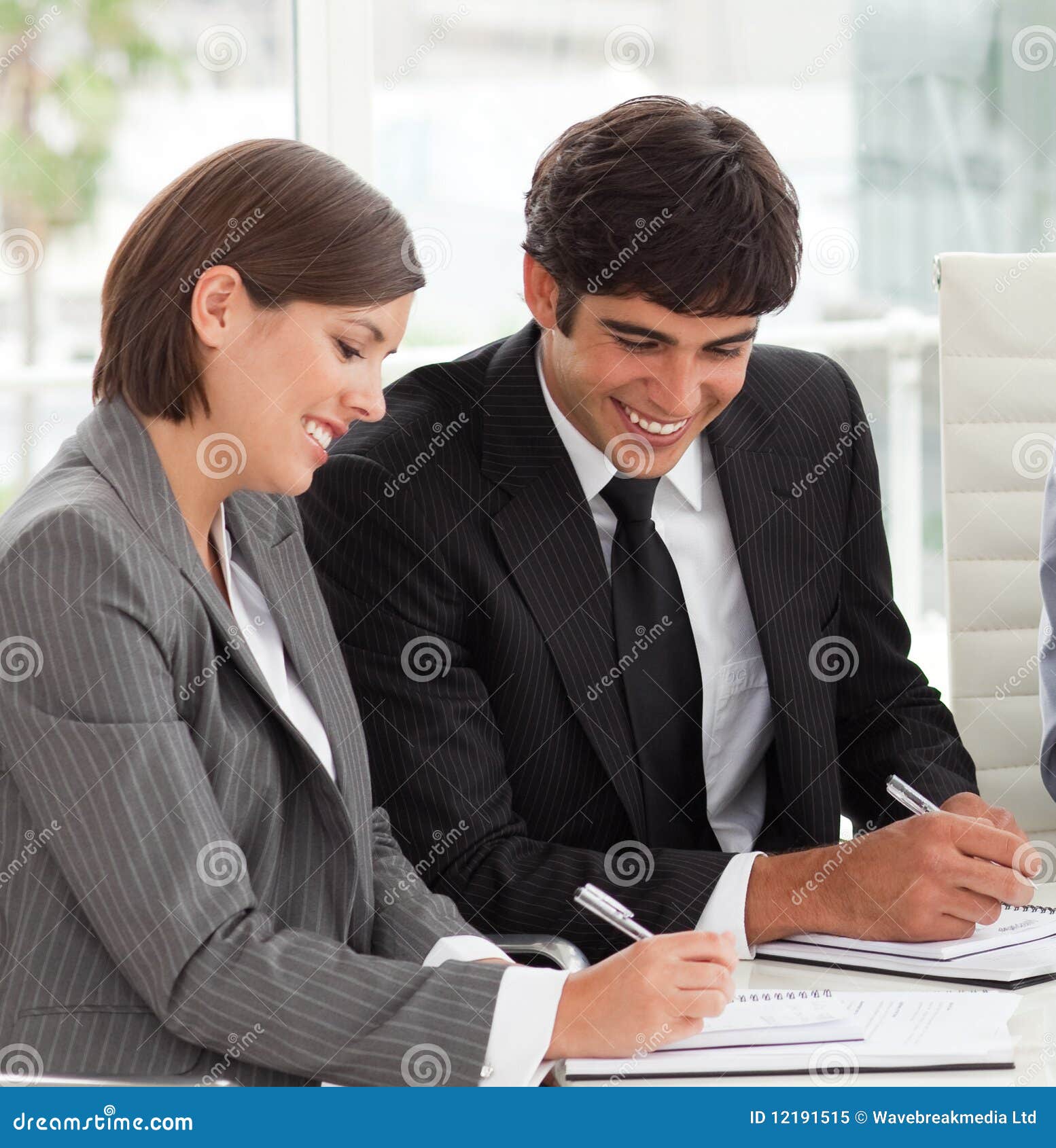 Two Colleagues Studying Sales Report Stock Image - Image of business ...