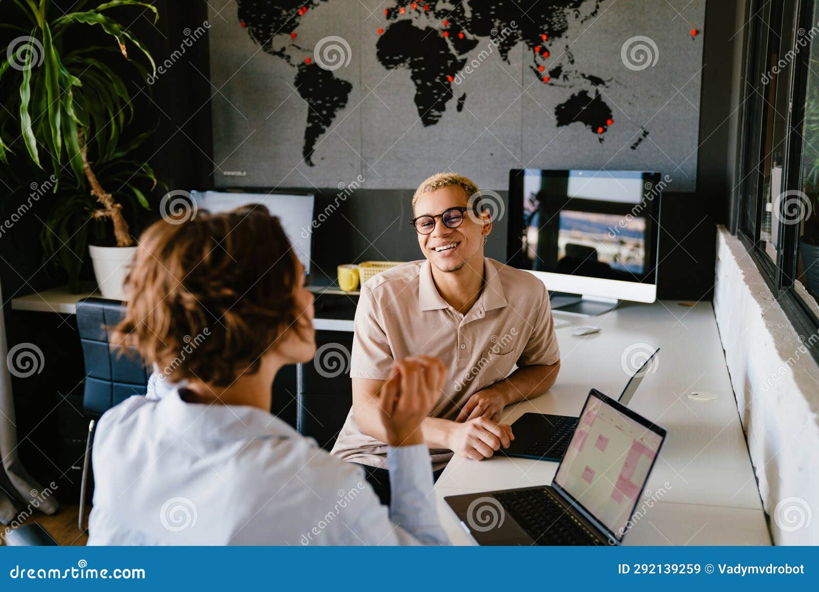 Two Colleagues Talking during Meeting in Modern Workspace Stock Image ...