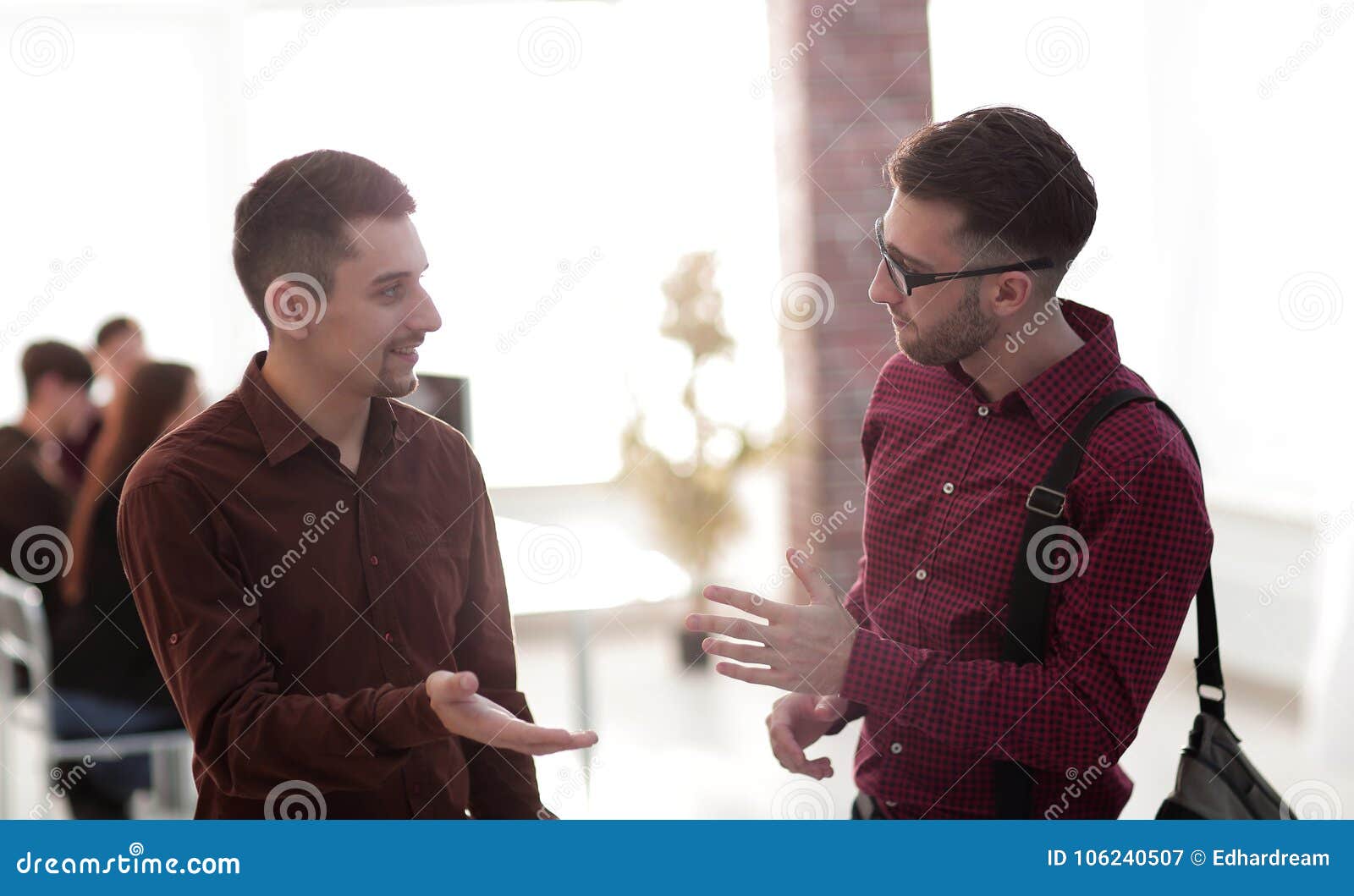 Two Colleagues Talking in Office Stock Image - Image of executive ...