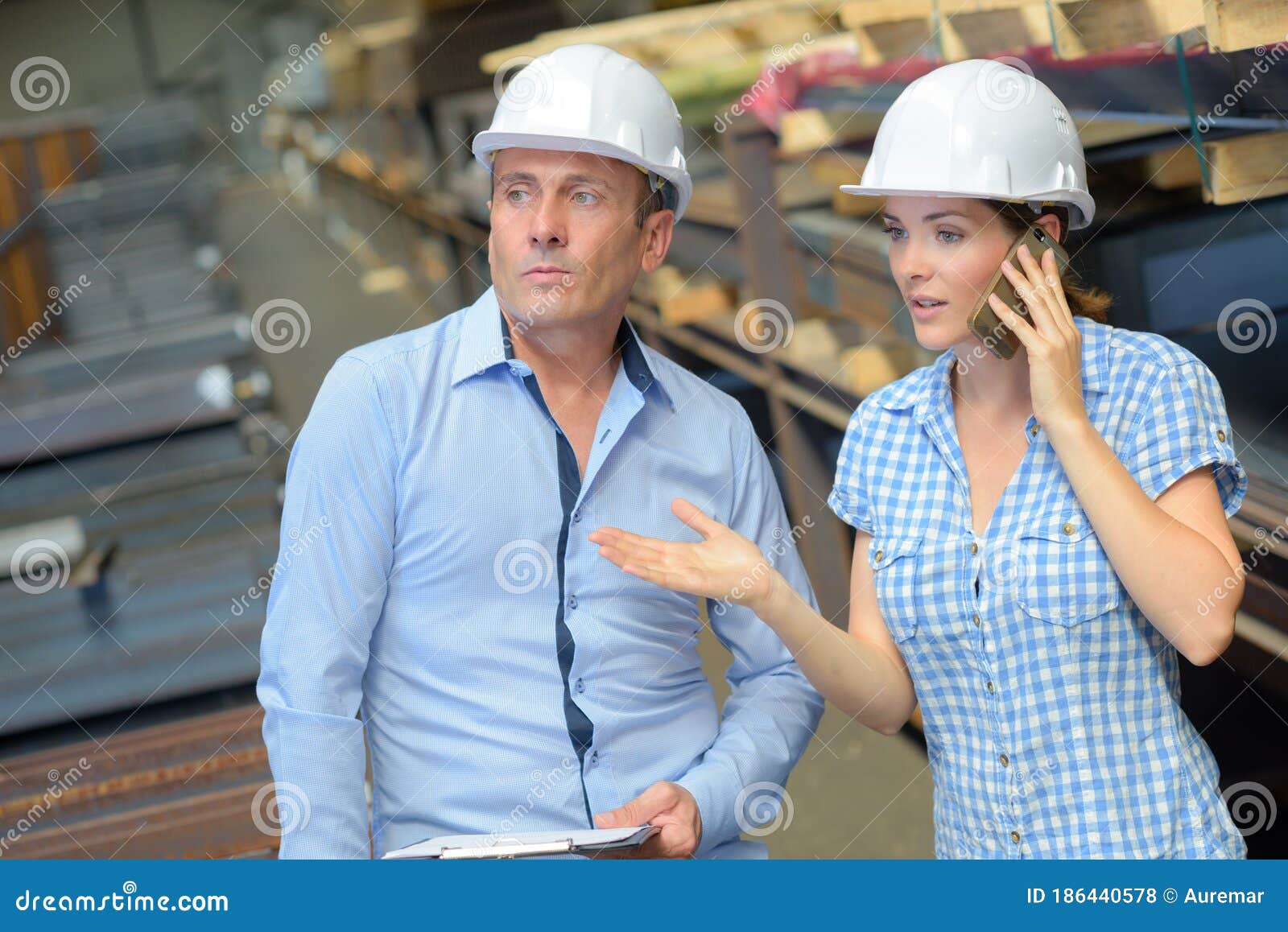 Two Colleagues Talking in Warehouse Stock Photo - Image of shipment ... Two Colleagues Talking in Warehouse Stock Photo - Image of shipment ...