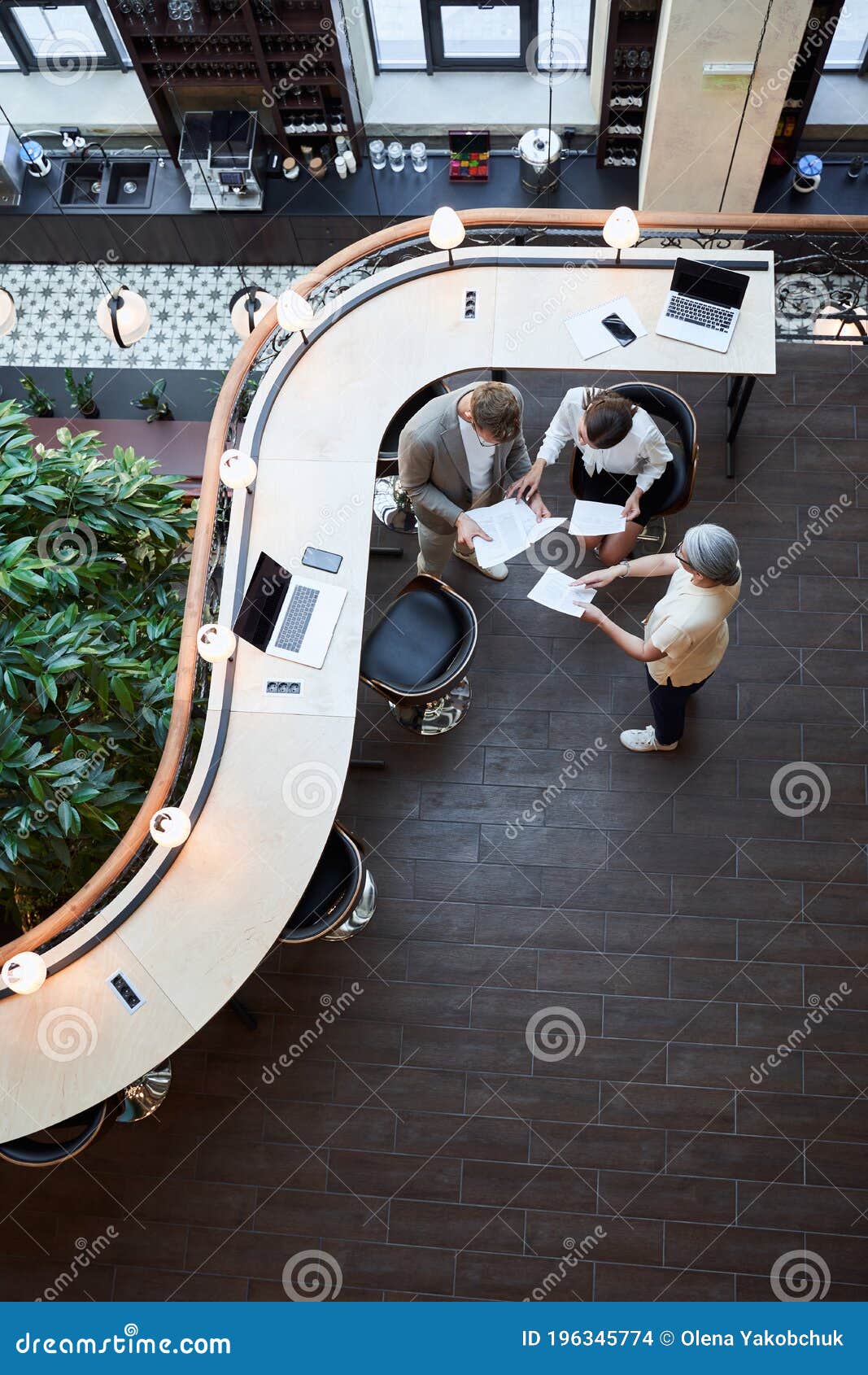 Two Colleagues and Their Manager are Checking Paperwork Stock Photo ...