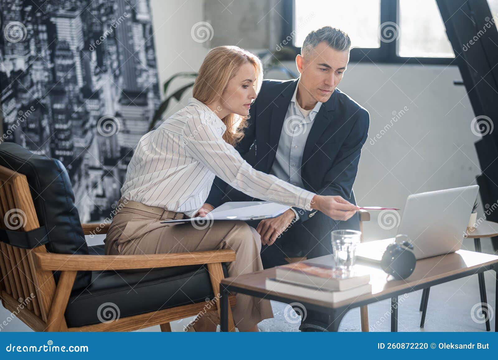 Two Colleagues Working on the Project Together Stock Photo - Image of ...