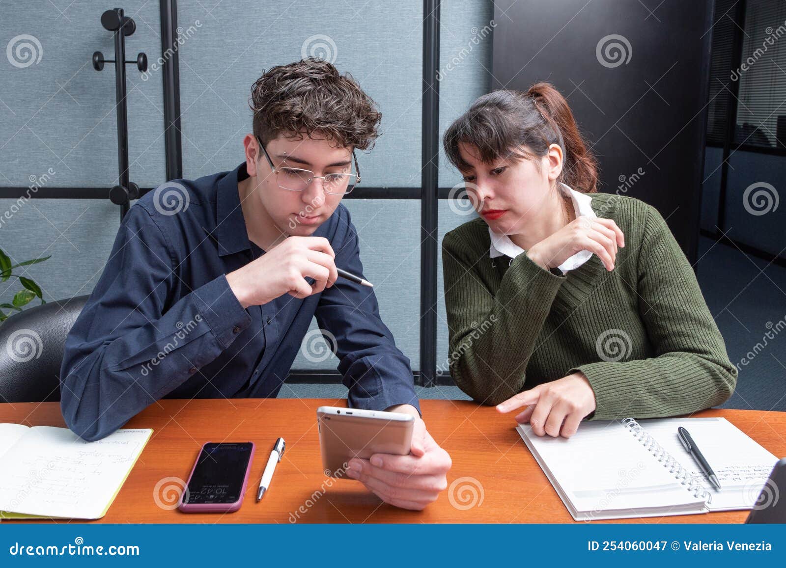 Two Colleagues Working Together in the Office Stock Image - Image of ...