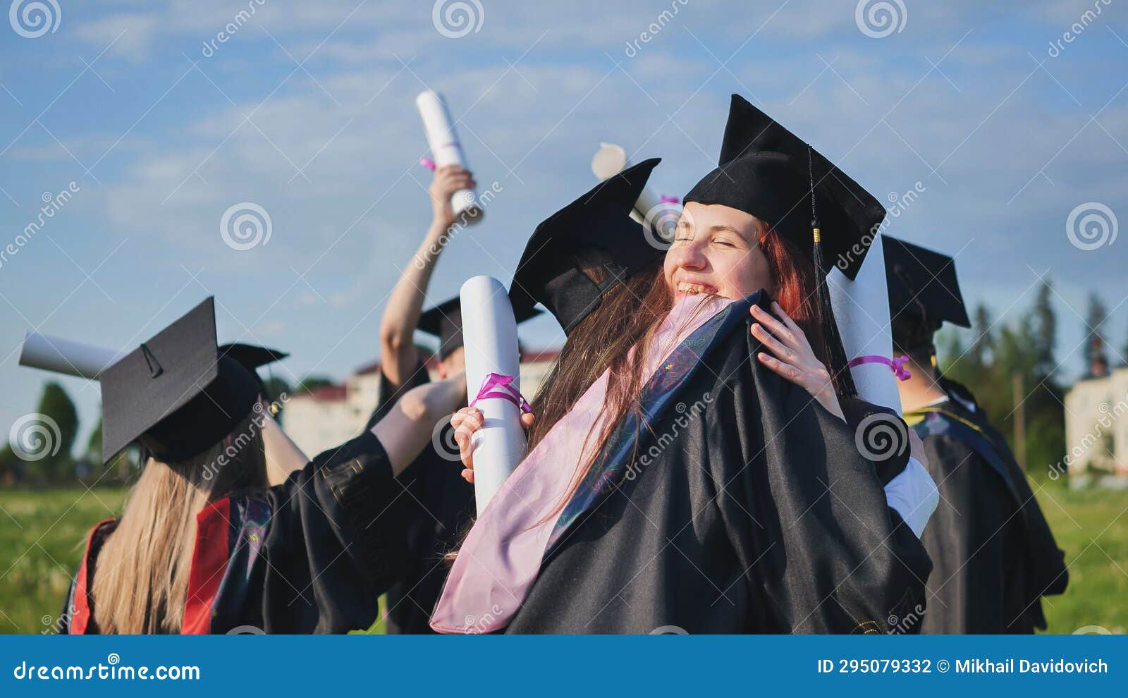 Two College Graduates Hugging on a Sunny Day. Stock Photo - Image of ...
