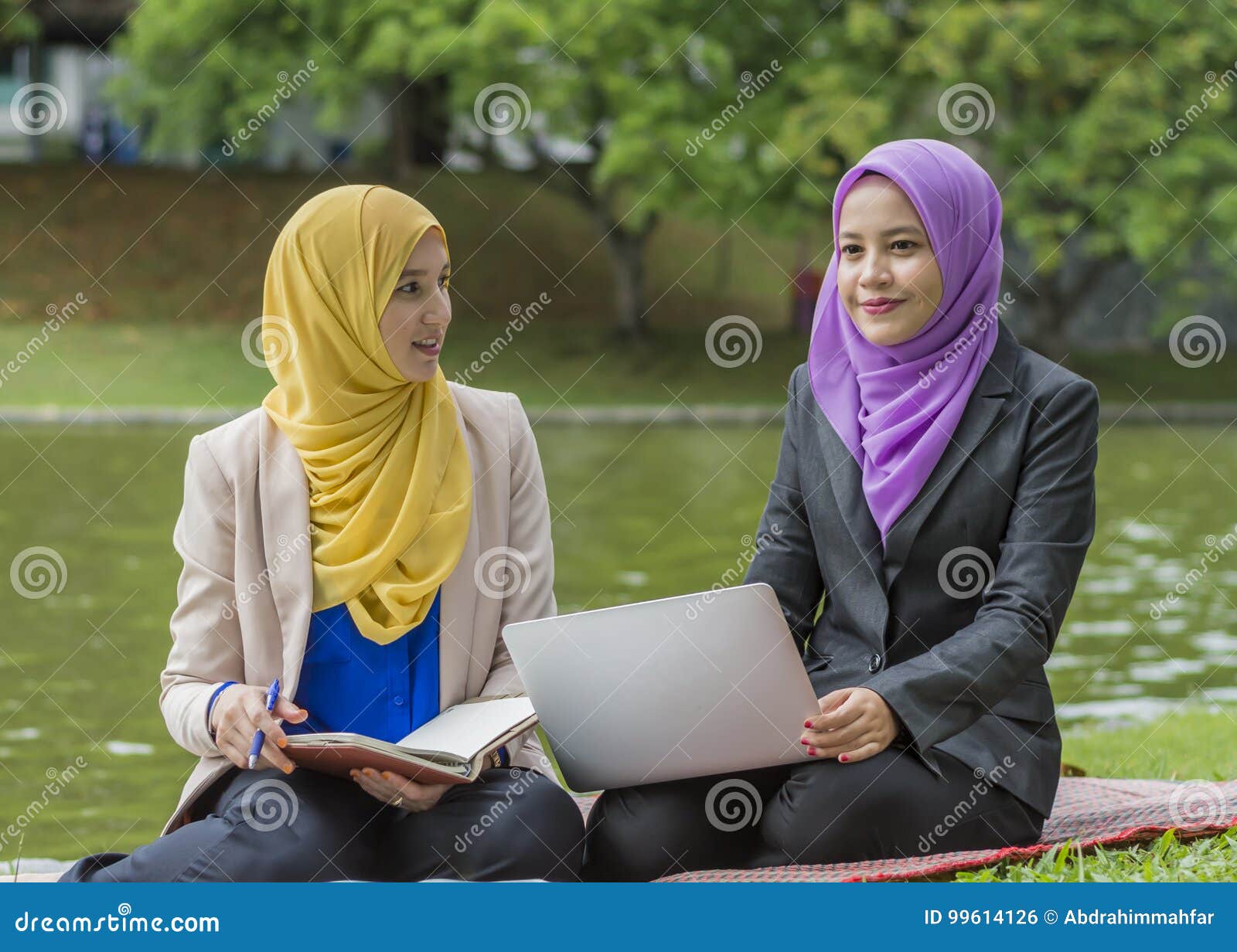 Two College Students Having Discussion and Changing Ideas while Sitting ...