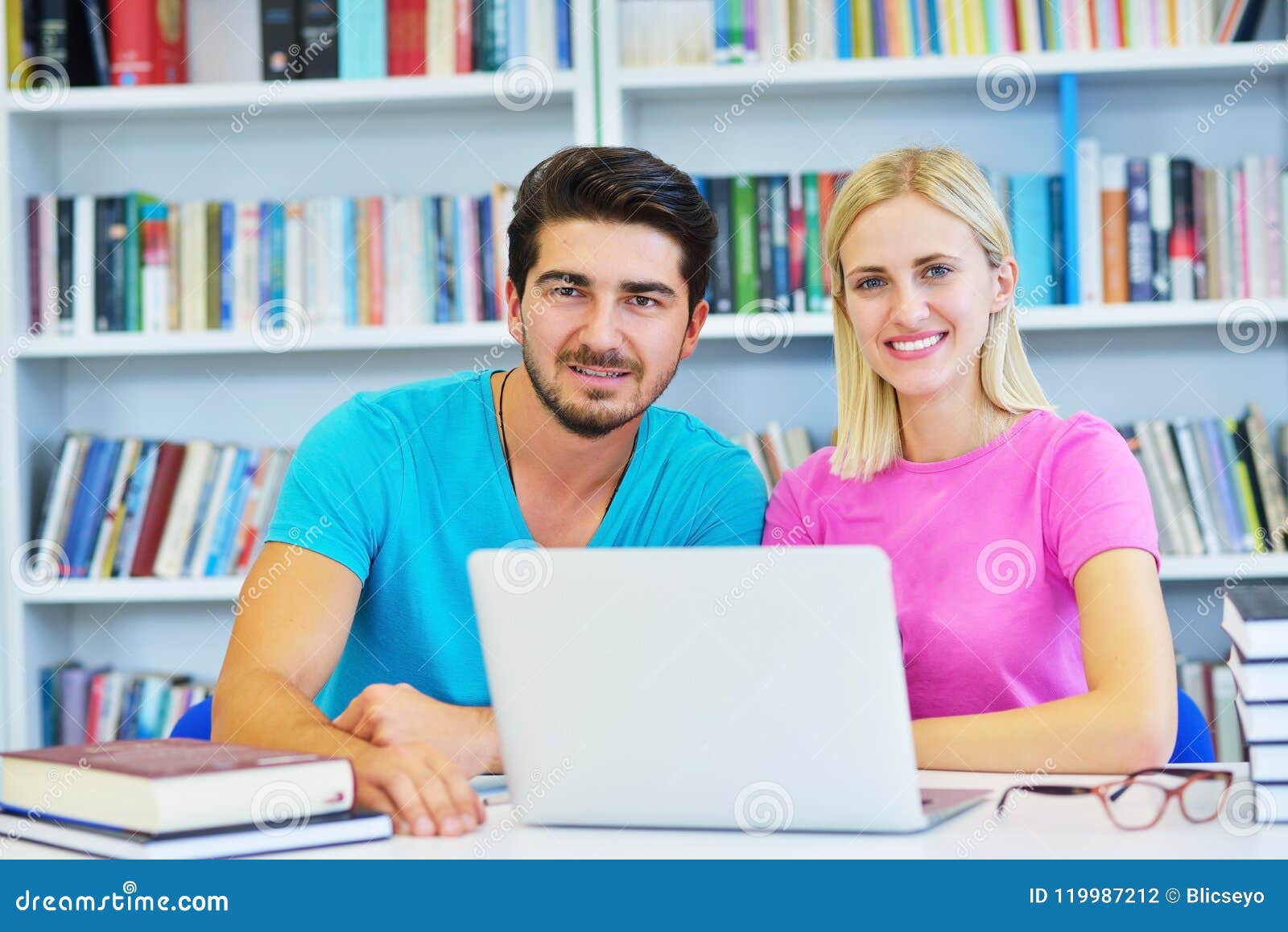 Two College Students in Library Stock Photo - Image of knowledge, hand ...