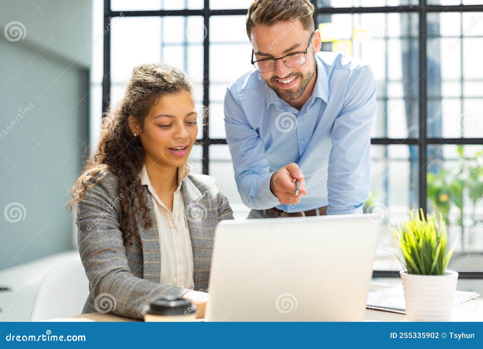 Two Collegues Discussing Documents and Other Working Moments in Office ...