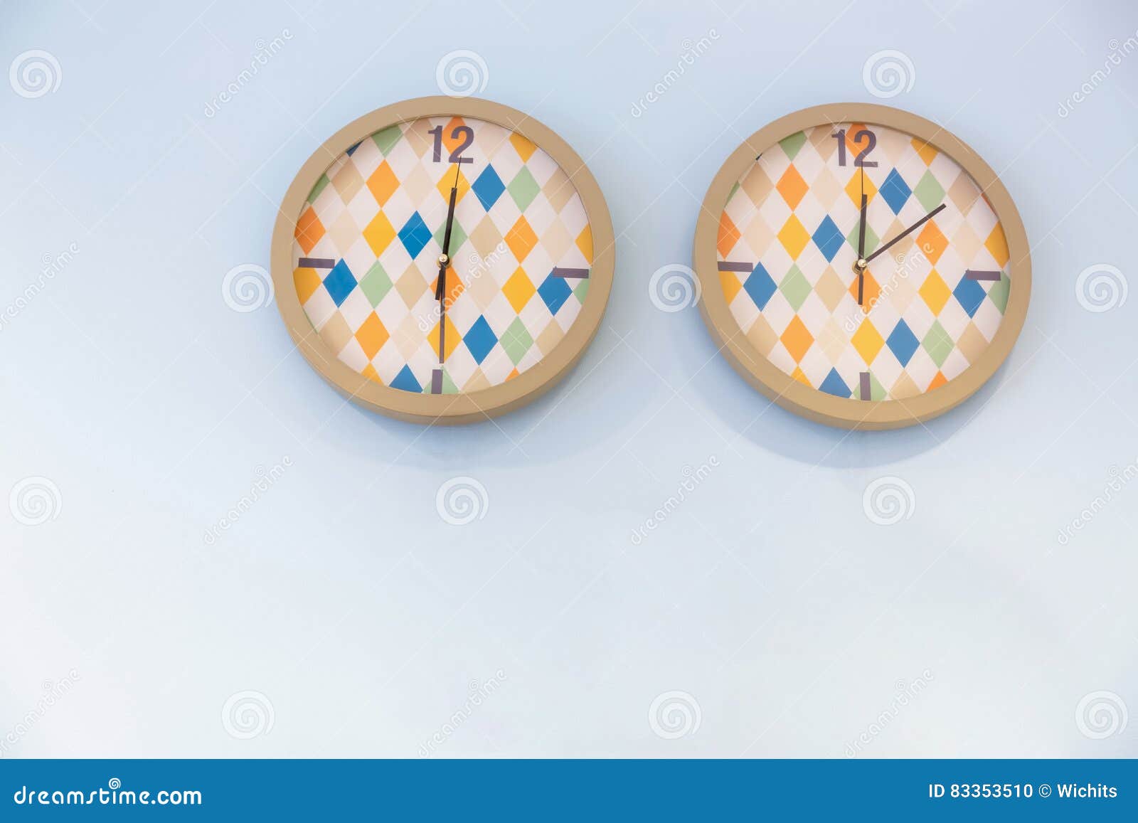 Two colorful clocks stock photo. Image of classic, blue - 83353510