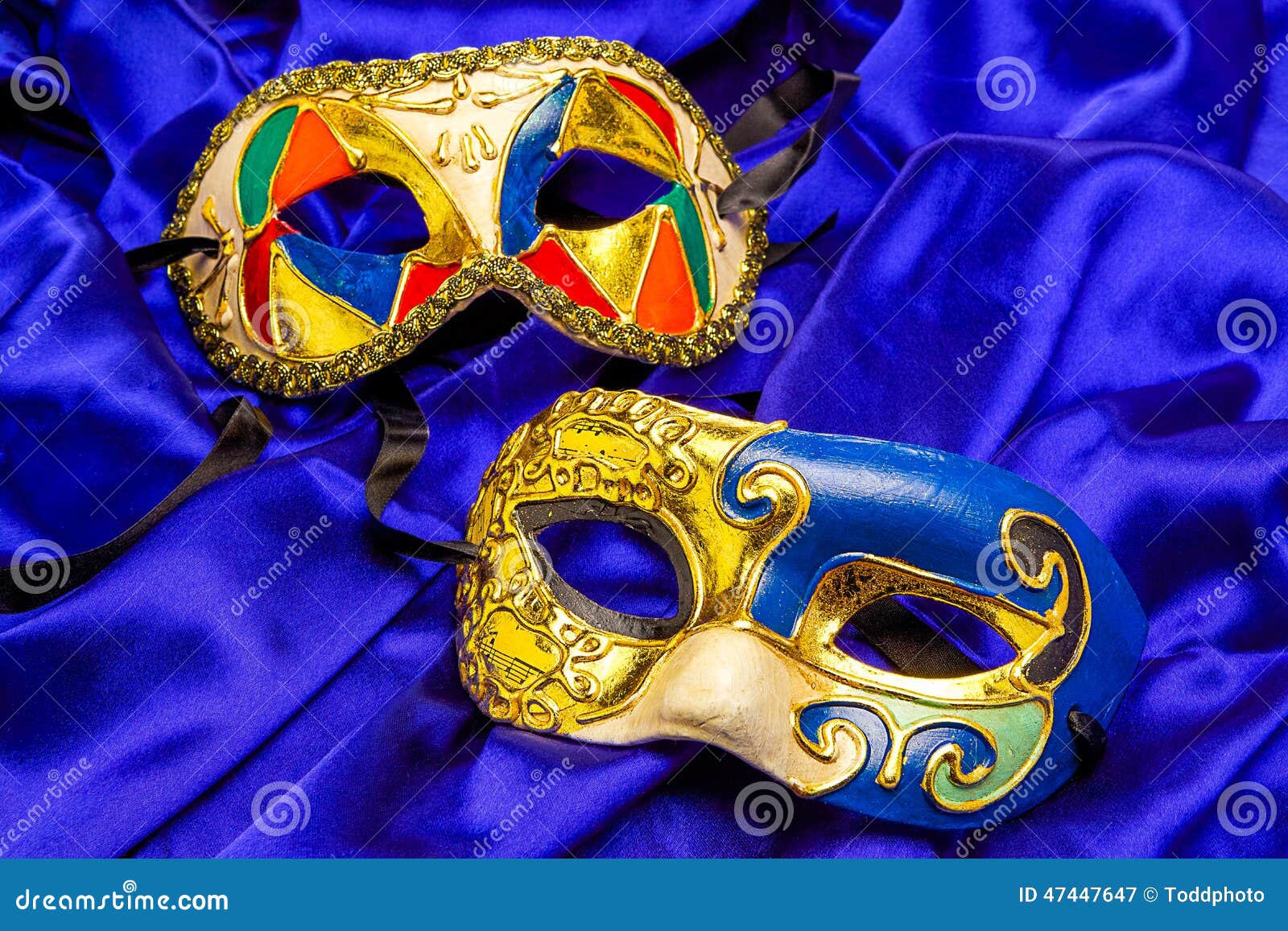 Two Colorful Mardi Gras Masks on Blue Silk Stock Image - Image of good ...