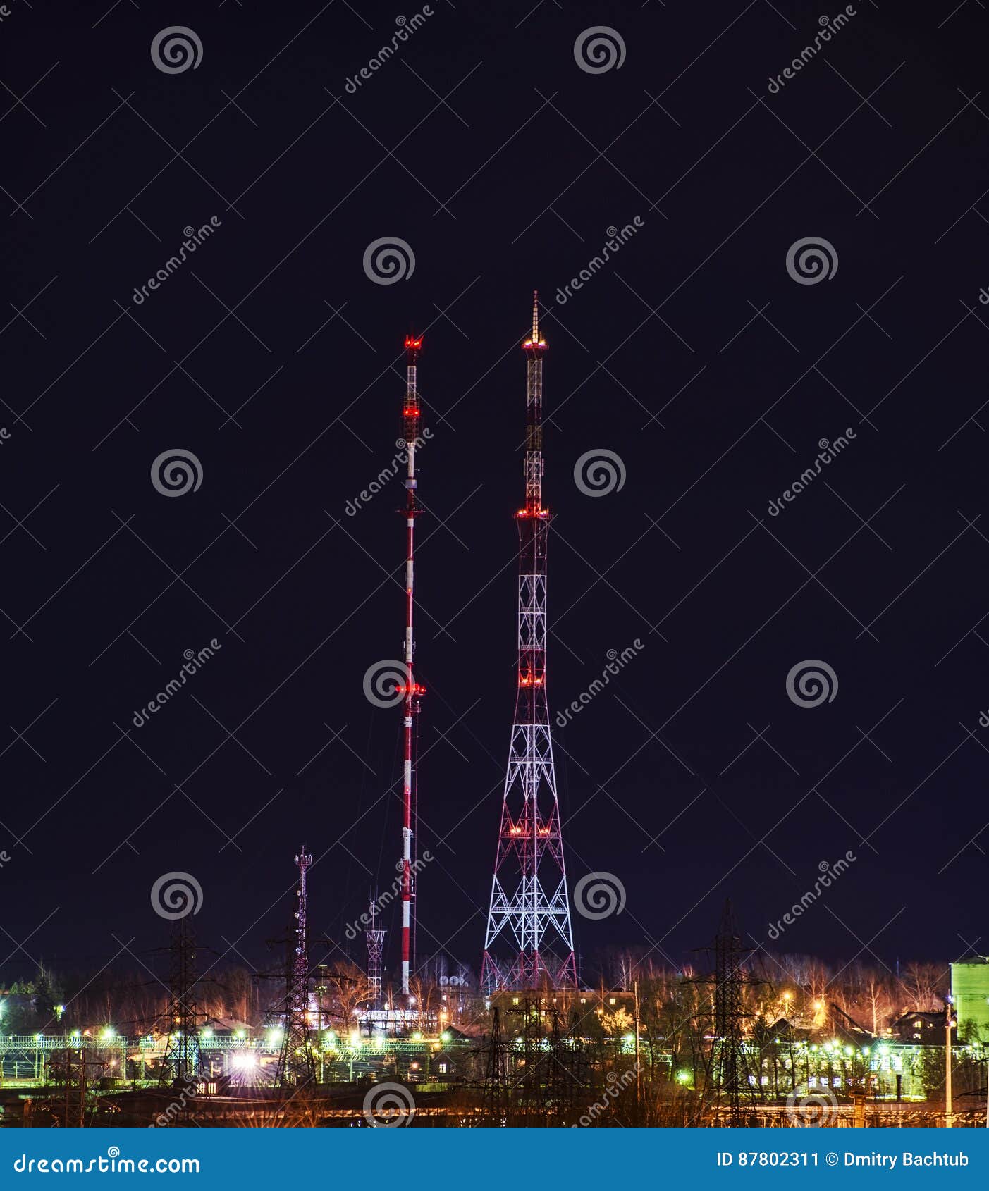 Two Communication Towers in the Night Sky Stock Image - Image of ...