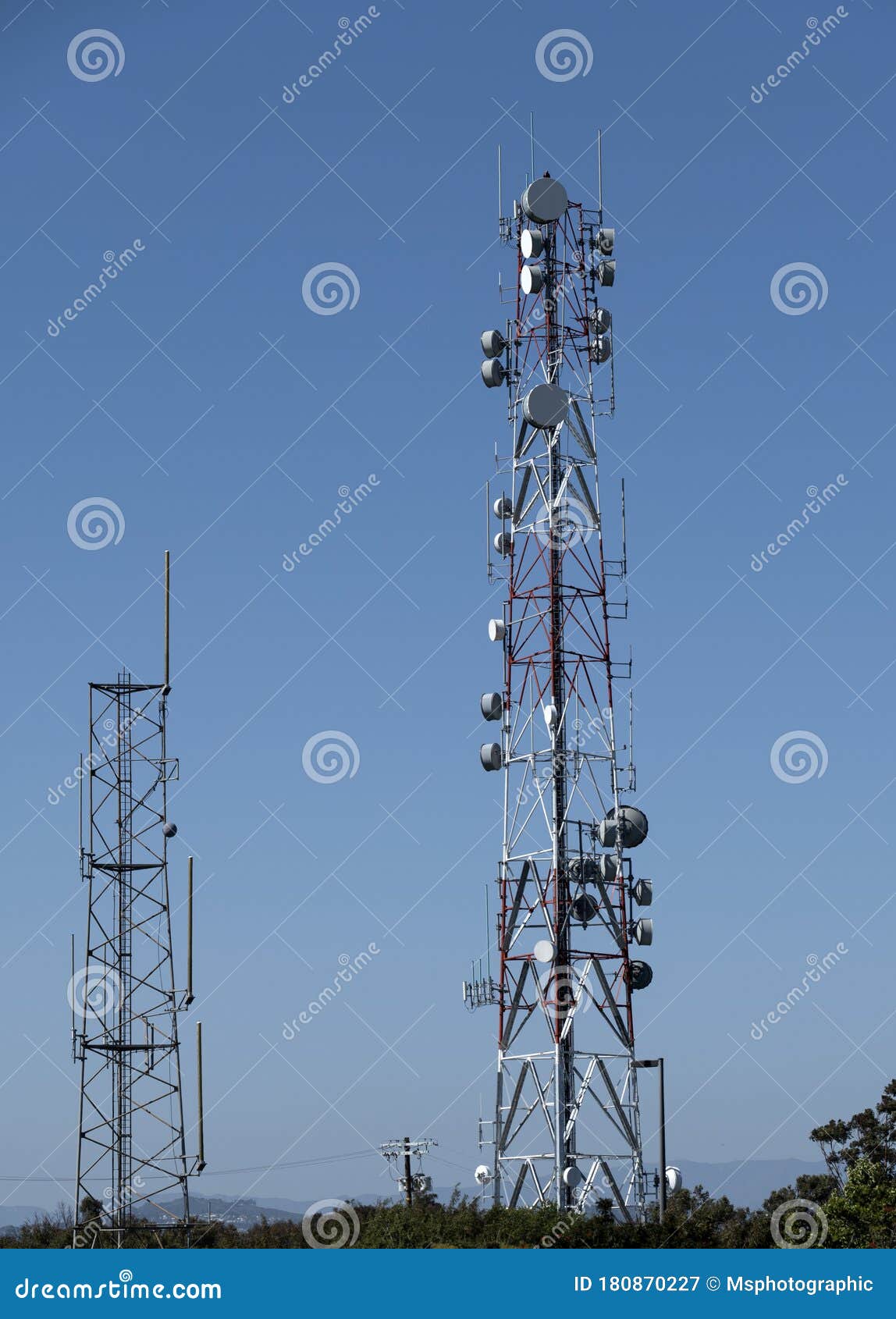 Two communications towers stock image. Image of communication - 180870227