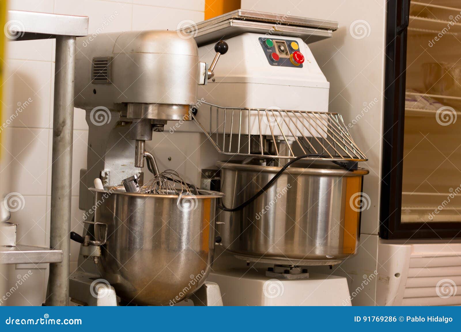 Two Complete Bread Mixer in Bakery, Mixing Dough for Baguettes in a ...