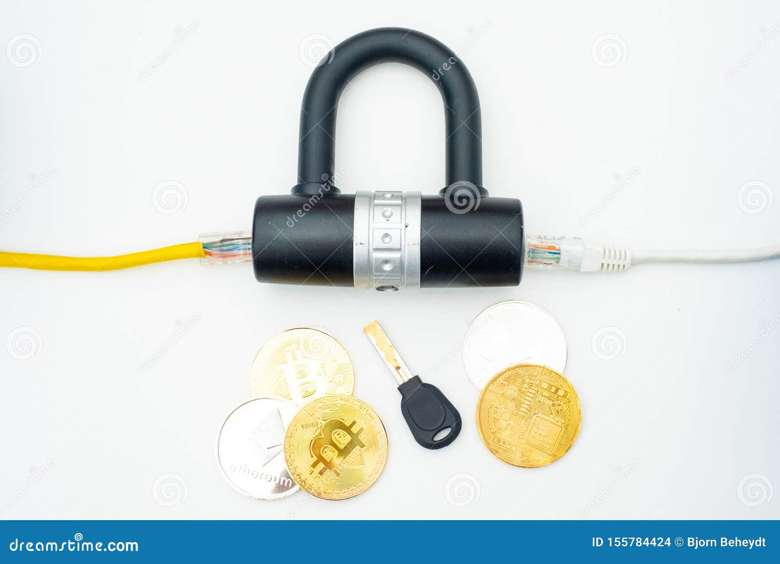 Two Computer Network Cables Going through a Lock with a Key and a ...