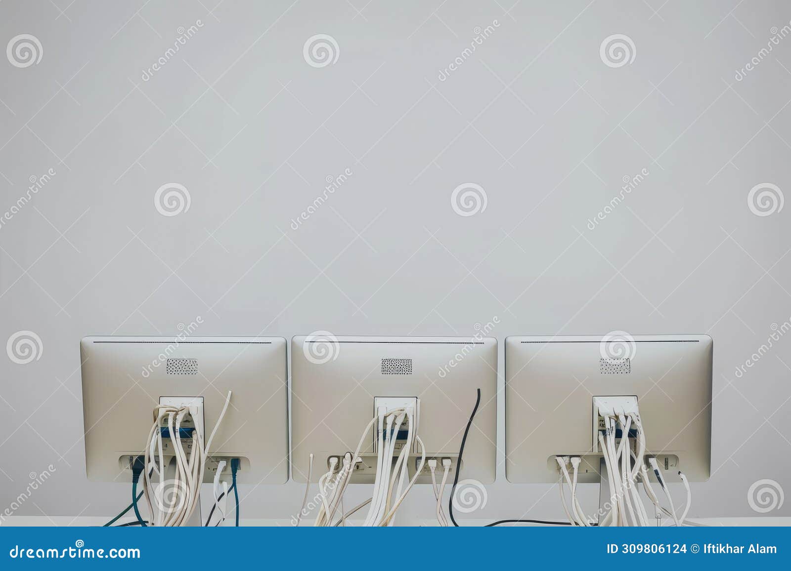 Two Computers Placed on Top of a Table in a Functional Arrangement ...