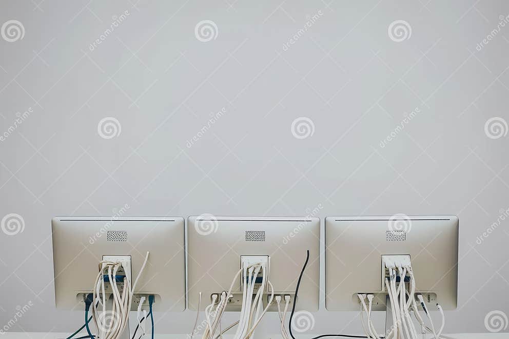 Two Computers Placed on Top of a Table in a Functional Arrangement ...