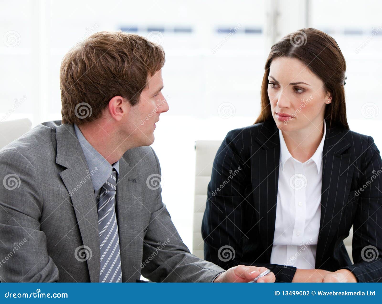 Two Concentrated Business People Talking Together Royalty-Free Stock ... Two Concentrated Business People Talking Together Royalty-Free Stock ...