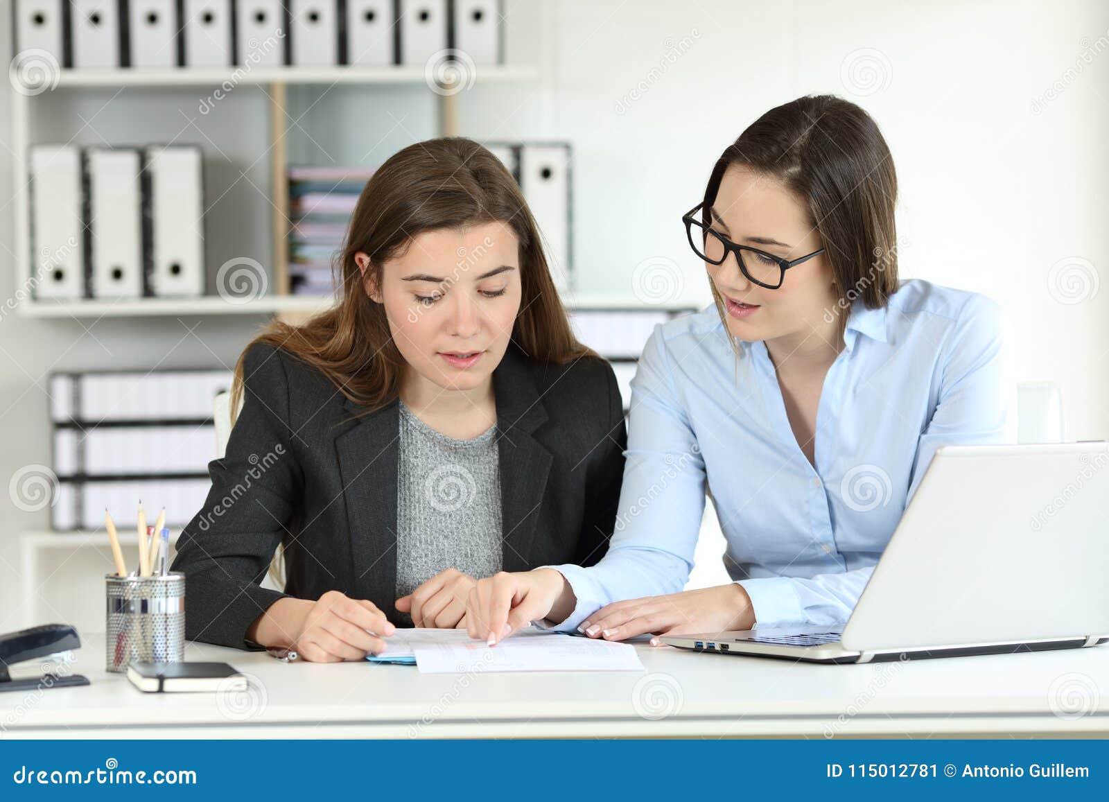 Two Office Workers Coworking on a Desktop Stock Image - Image of desk ...
