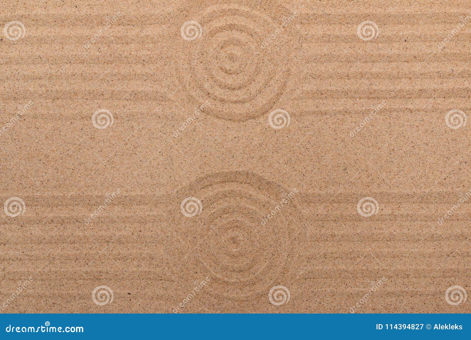 Two Concentric Circle and Lines on the Sand, with a Place for Designer ...