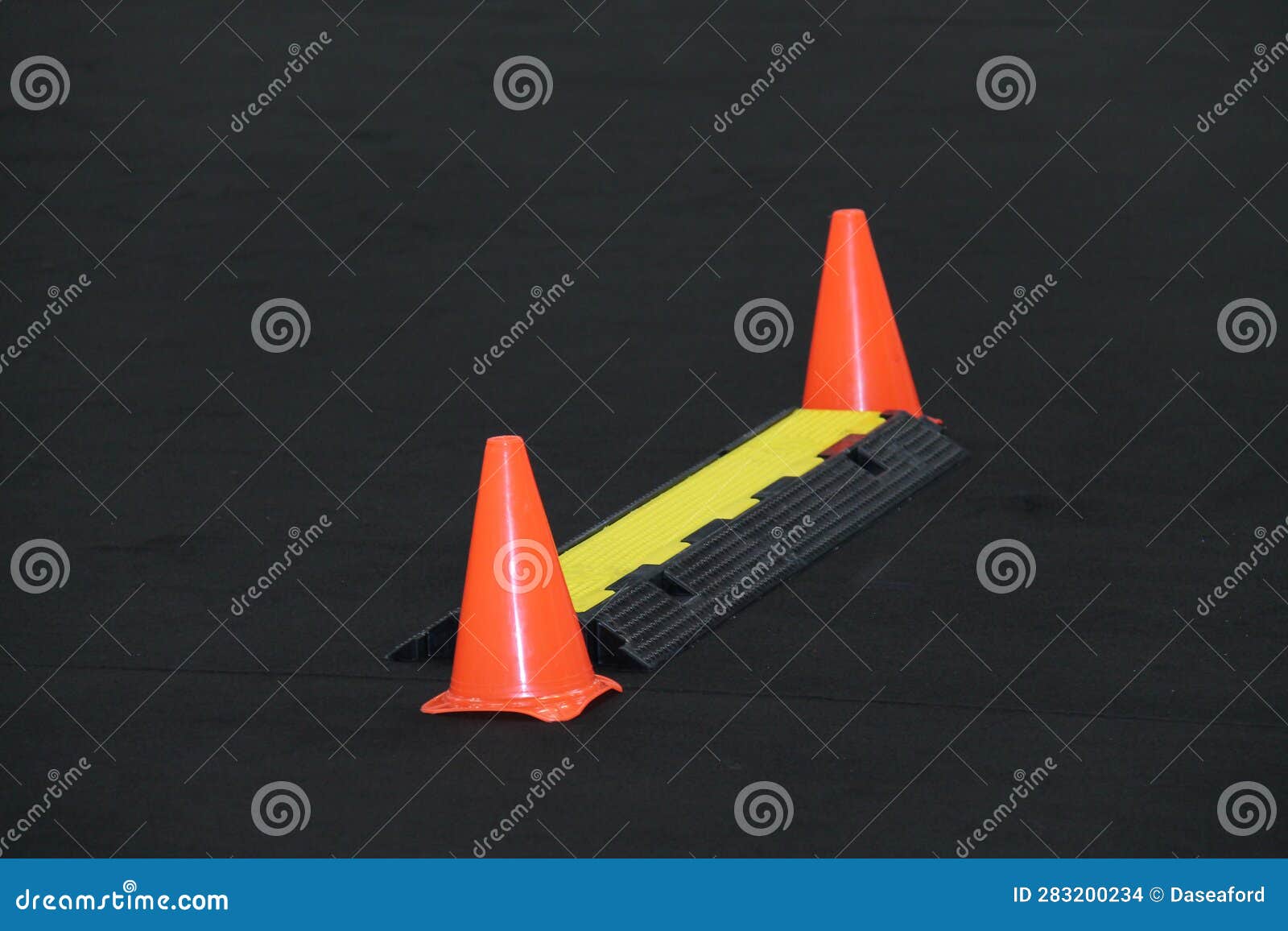 Two Cones Marking a Ramp. stock photo. Image of marking - 283200234
