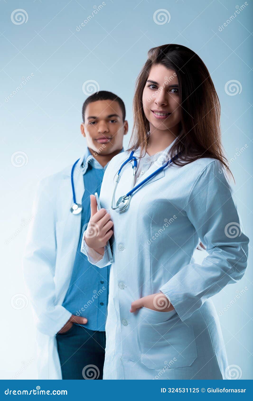 Two Confident Doctors Smiling Posing with Stethoscope Stock Image ...