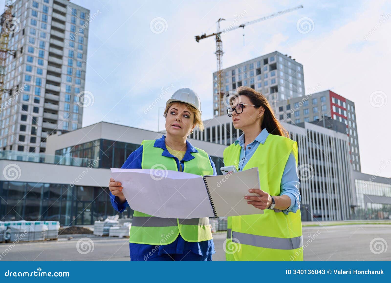 Two Confident Women Talking Working on Construction of Residential ...