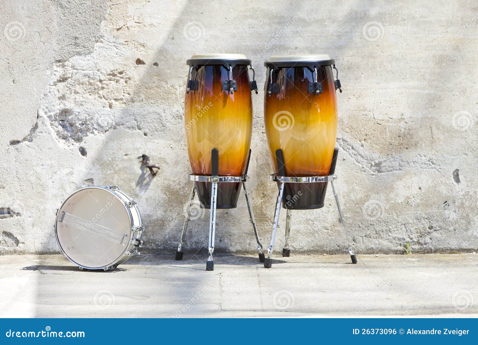 Two Congas in Front of a Vintage Wall Stock Photo - Image of empty ...