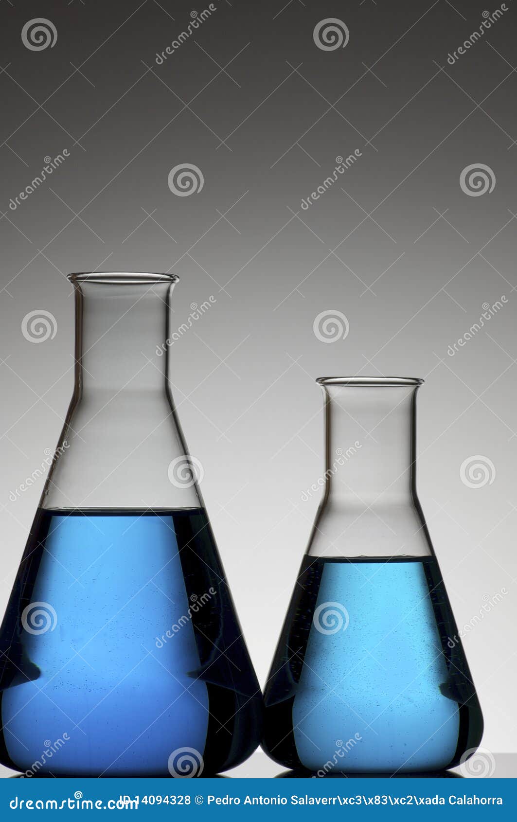 Conical Flasks With Blue Liquid On Background. Laboratory Glassware ...