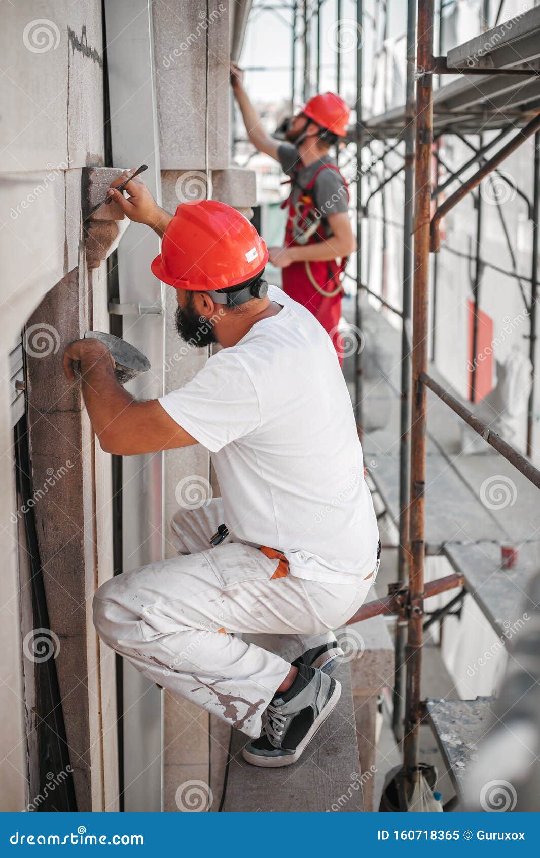 Two Construction Mason Worker Mixing Cement and Sand with Spatula Stock ...