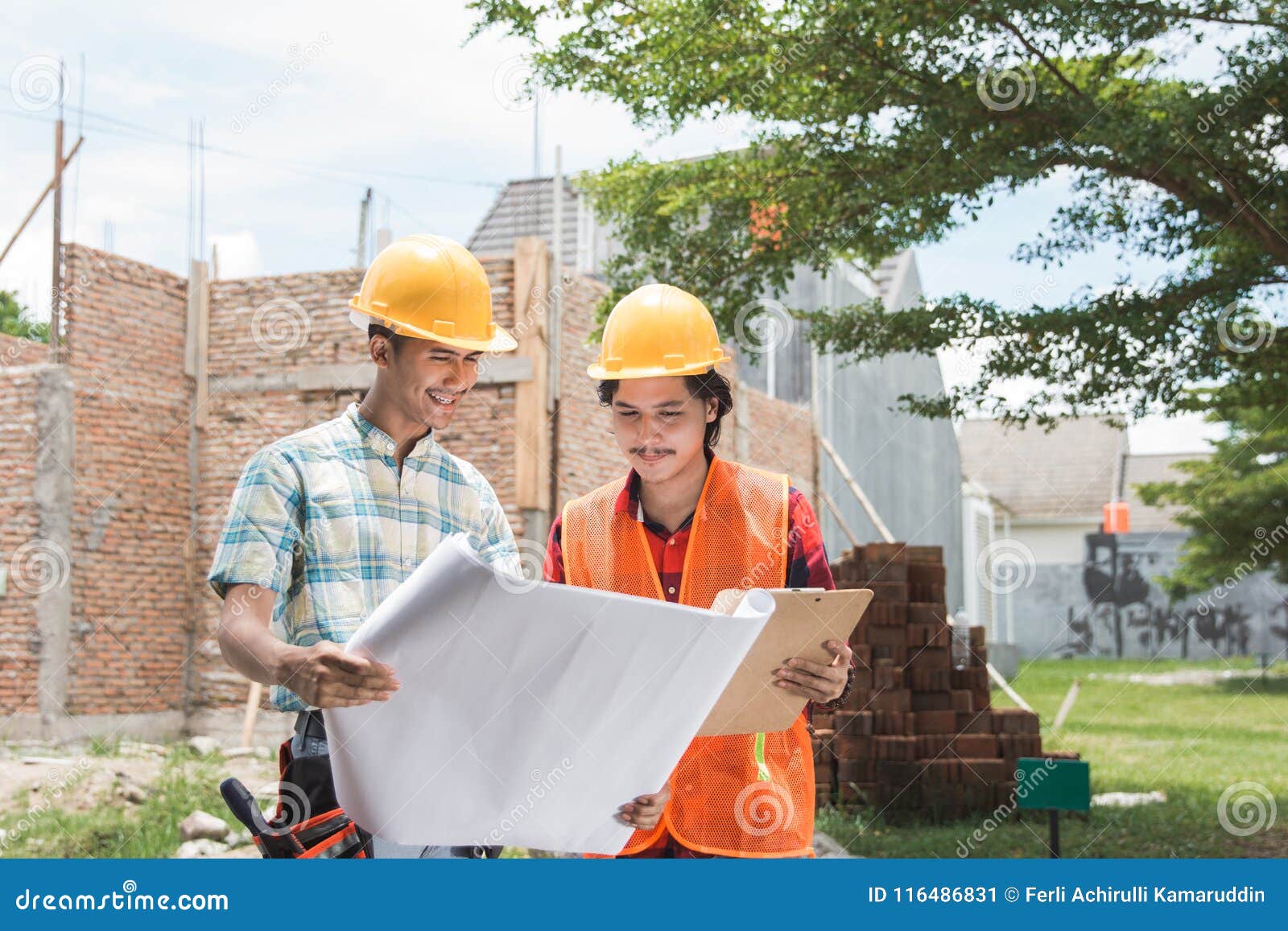 Two Construction Worker Standing in Front of the Building Site Stock ...