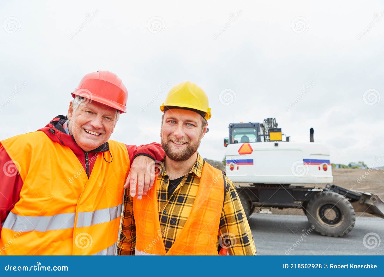 Two Construction Workers As Colleagues on the Construction Site Stock ...