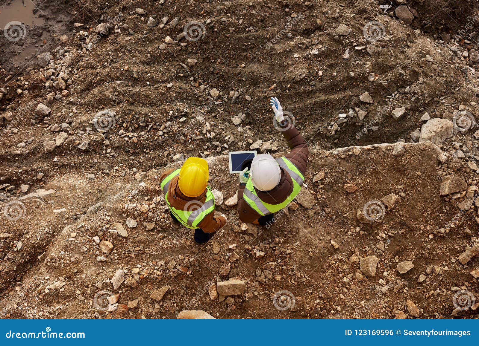 Two Construction Workers Inspecting Site Stock Photo - Image of mineral ...