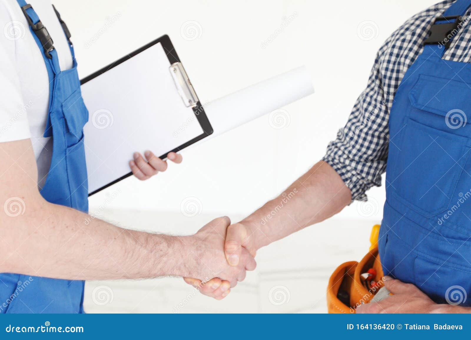 Two Construction Workers Shaking Hands Stock Photo - Image of agreement ...